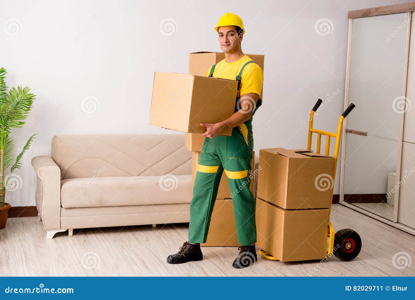 The Man Delivering Boxes during House Move Stock Image - Image of house ...