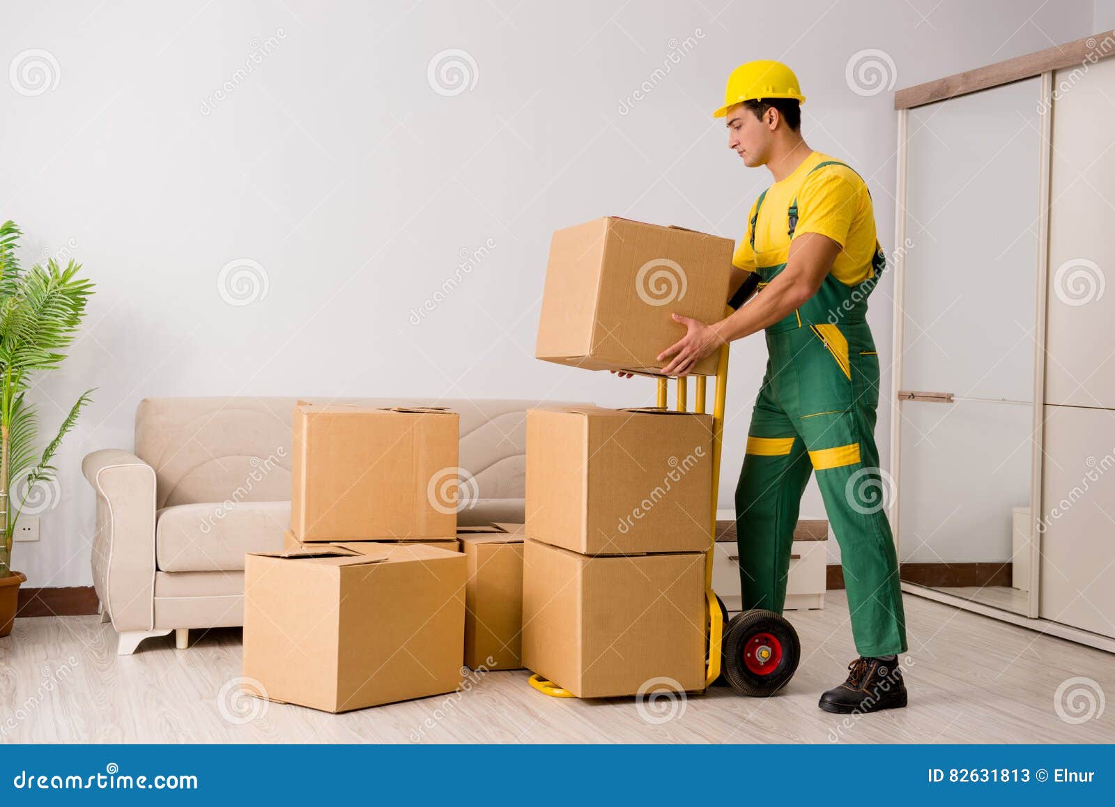 The Man Delivering Boxes during House Move Stock Image - Image of ...