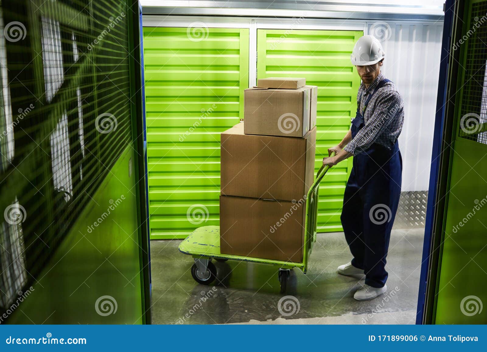 Man delivering parcels stock photo. Image of packing - 171899006