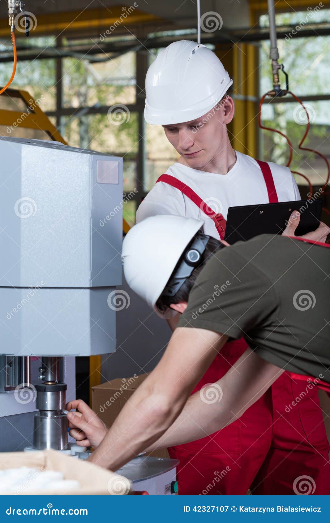 Man Demonstrating Factory Machine To Inspector Stock Image - Image of ...