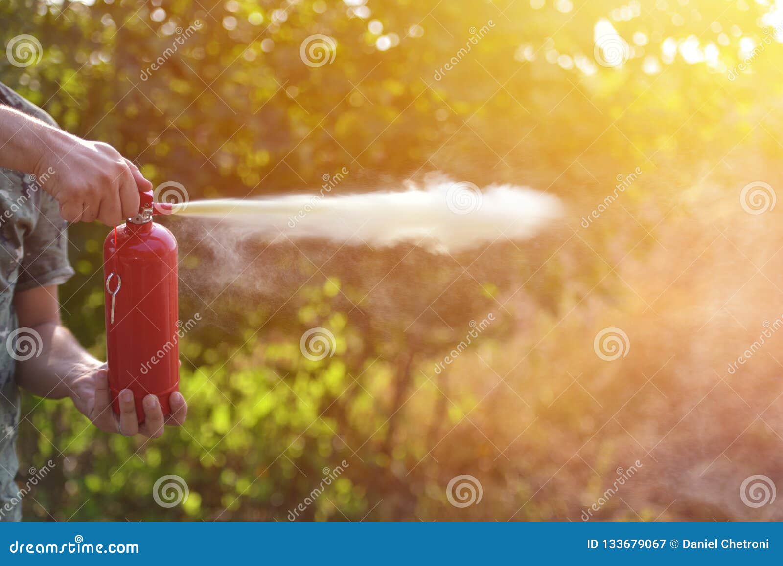 A Man Demonstrating How To Use a Fire Extinguisher Stock Image - Image ...