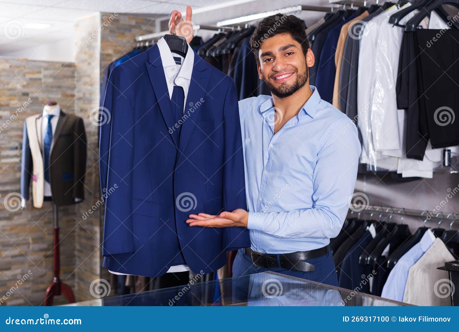 Man Demonstrating Suit in Shop Stock Photo - Image of deciding, shopper ...