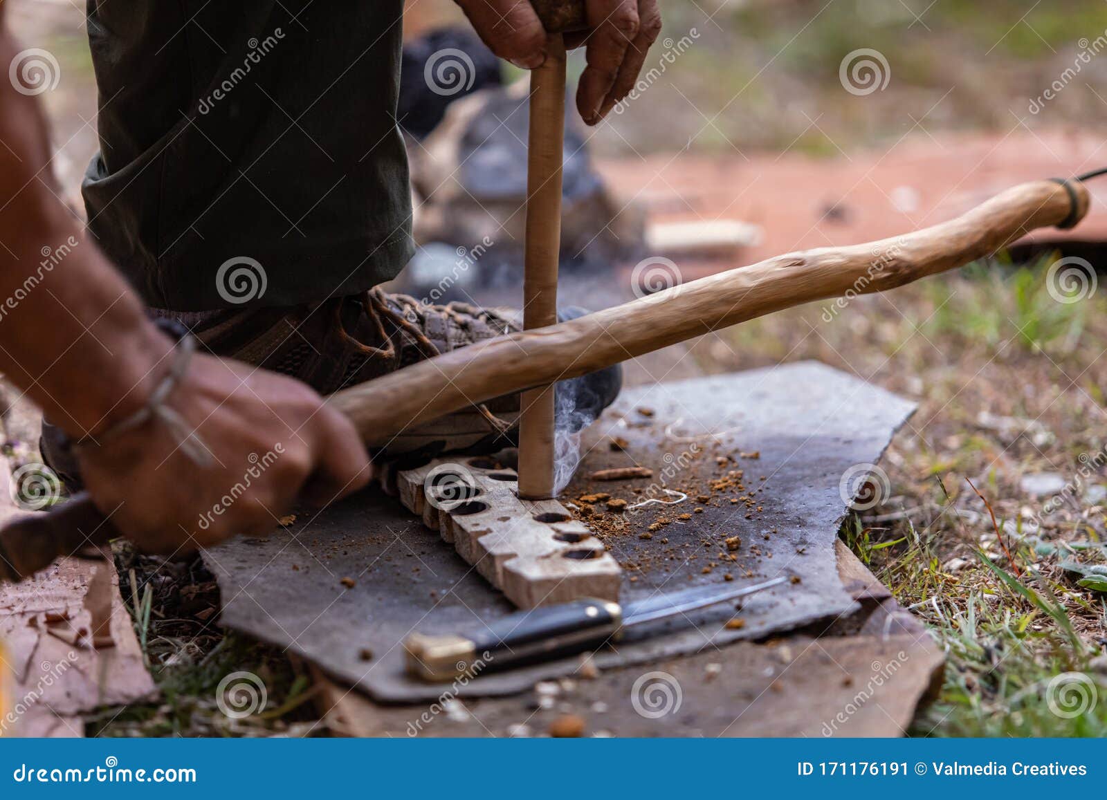 Man Demonstrating Traditional Fire Technique Stock Image - Image of ...