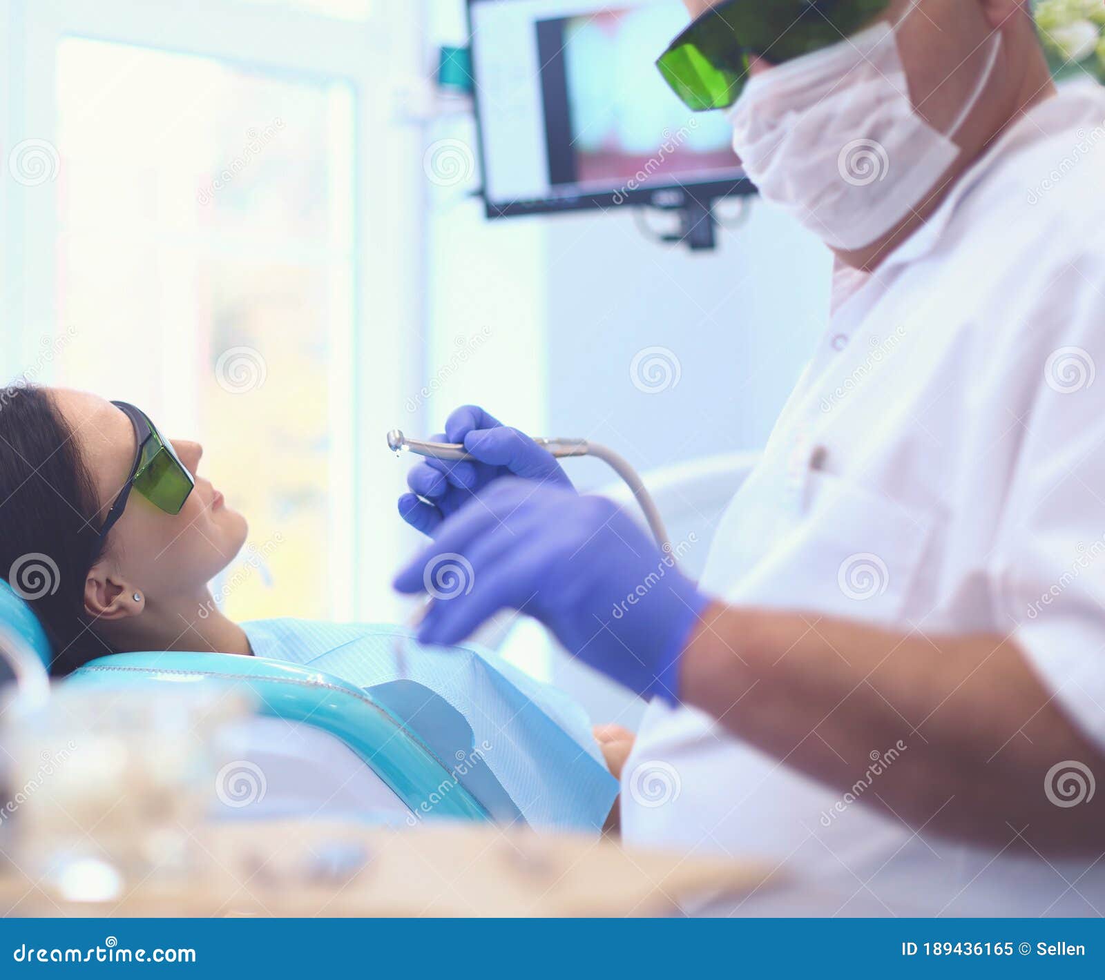 Man Dentist Working at His Patients Teeth Stock Image - Image of ...