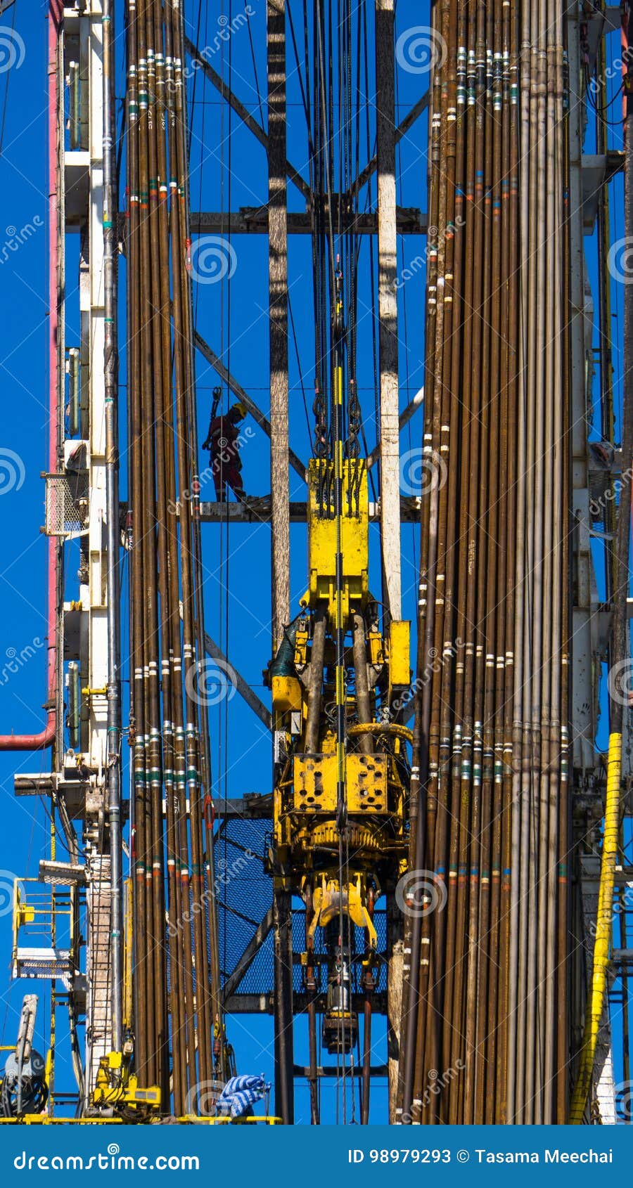 Man on the derrick stock image. Image of exploration - 98979293