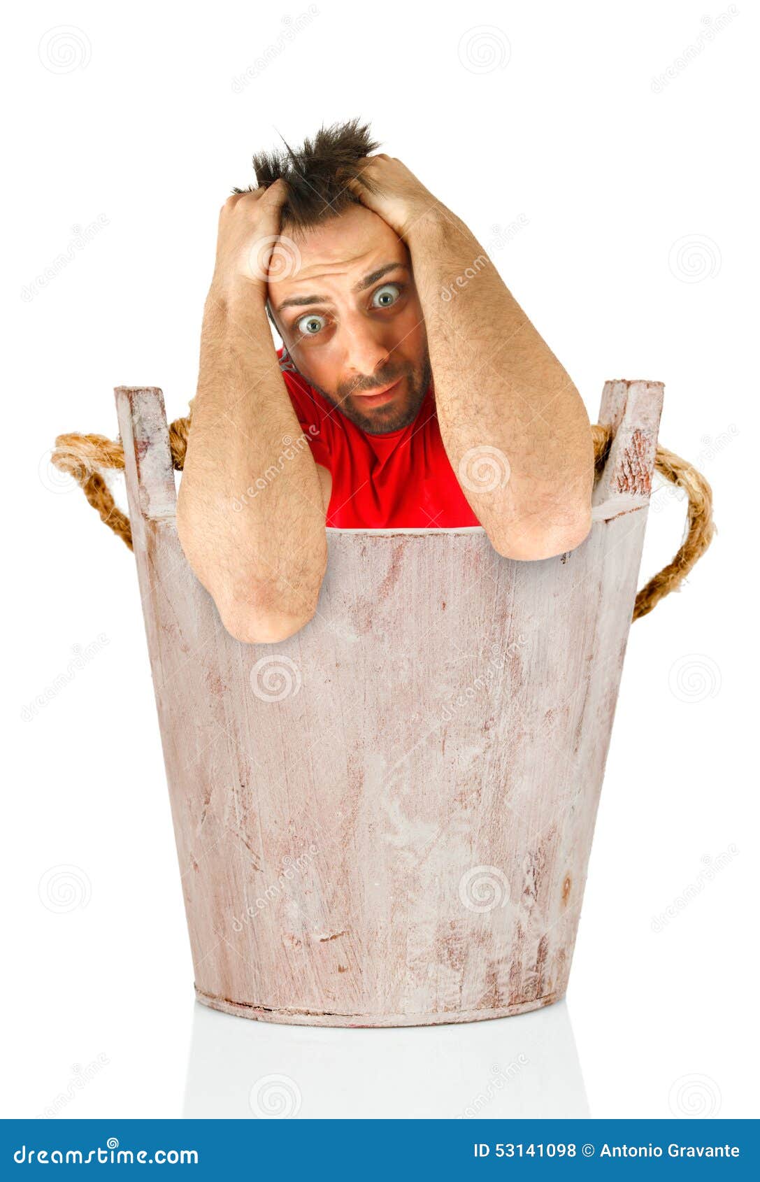 Man with a Desperate Expression in Wooden Bucket. Stock Photo - Image ...