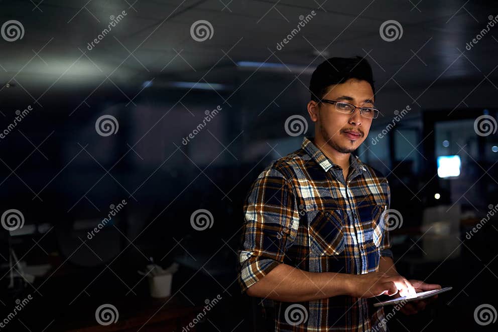 Man, Developer and Tablet in Office at Night for Software Development, Coding and Code Analytics ...