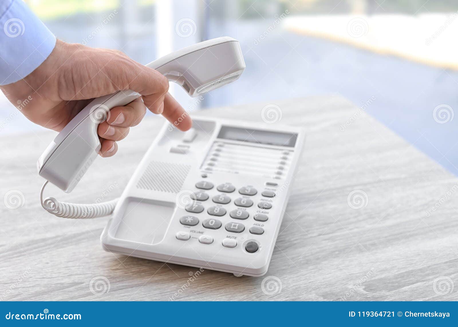 Man Dialing Number on Telephone at Table Stock Image - Image of closeup ... Man Dialing Number on Telephone at Table Stock Image - Image of closeup ...