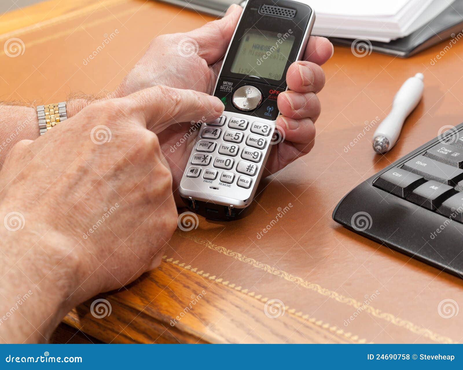 Man Dialing from Wireless Phone Stock Photo - Image of keyboard, cell ...