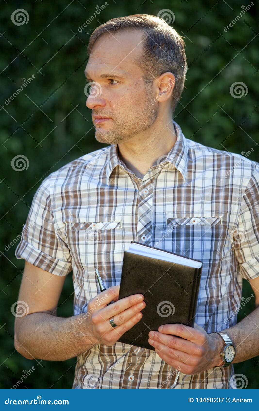 Man with diary outdoor stock image. Image of advice, holding - 10450237