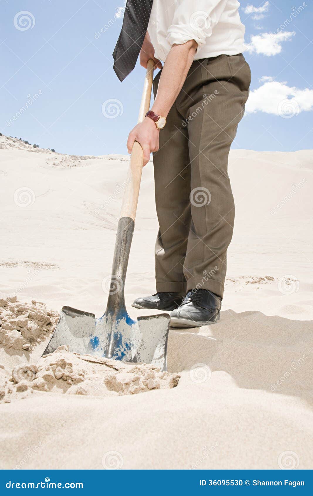 Man digging in desert stock photo. Image of desk, exterior - 36095530
