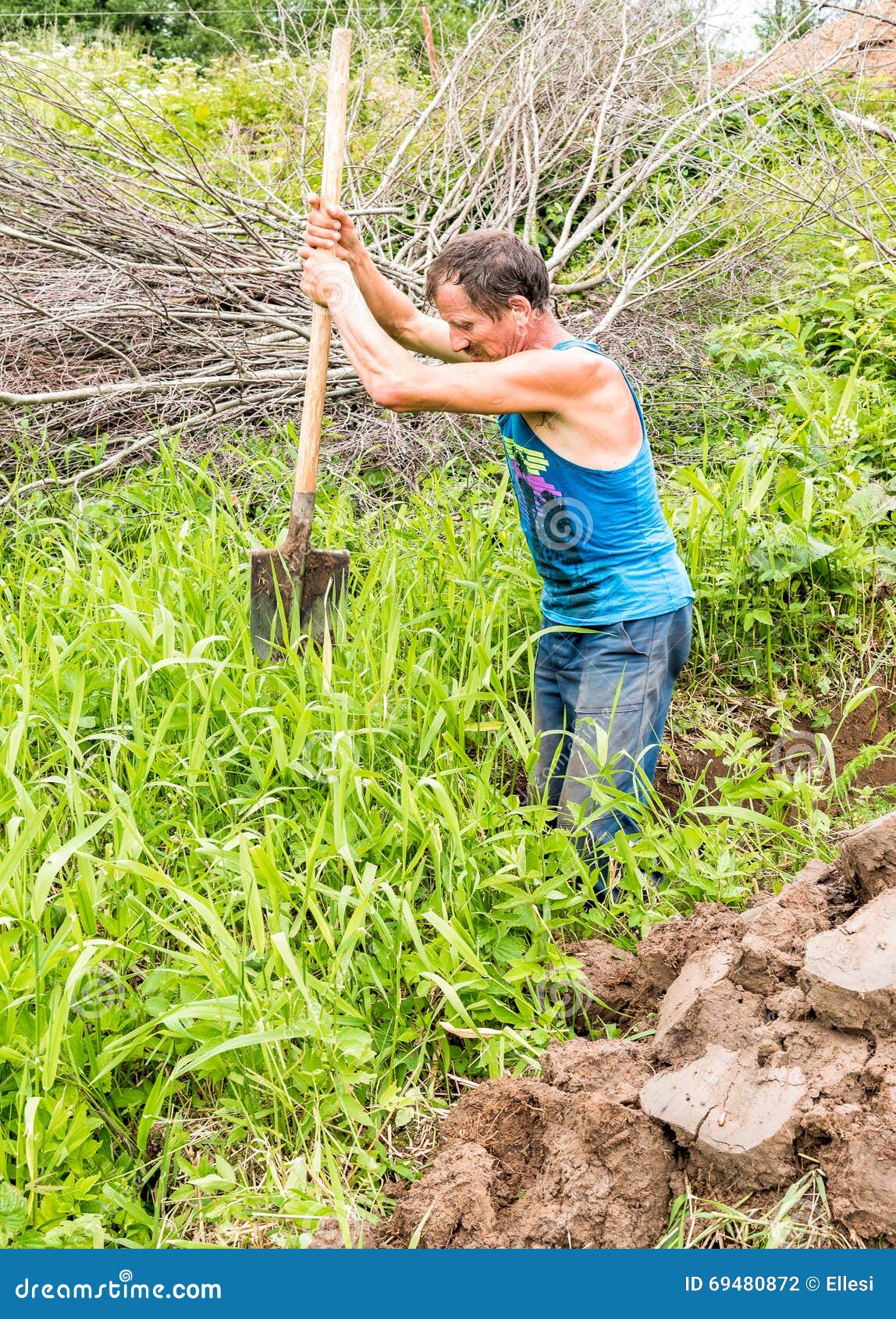 Man digging the ground. stock photo. Image of hole, construction - 69480872