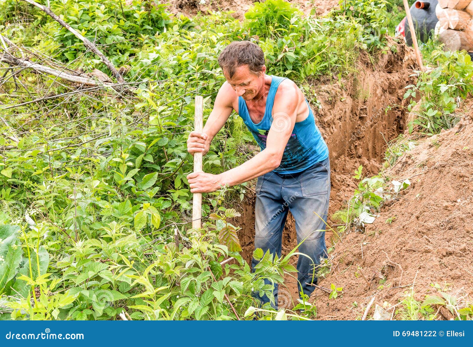 Man digging the ground. stock photo. Image of agriculture - 69481222