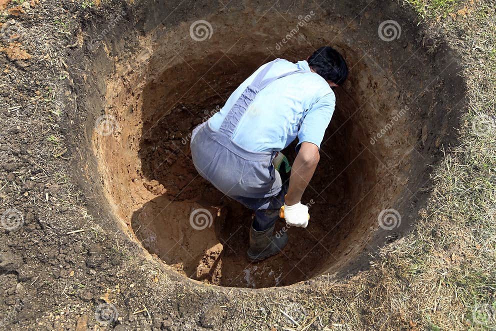A man digging a new well editorial image. Image of clay - 78870405