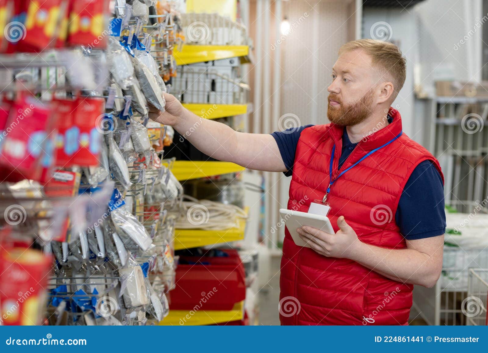 Man with Digital Tablet Checking Goods on Large Display Stock Image ...