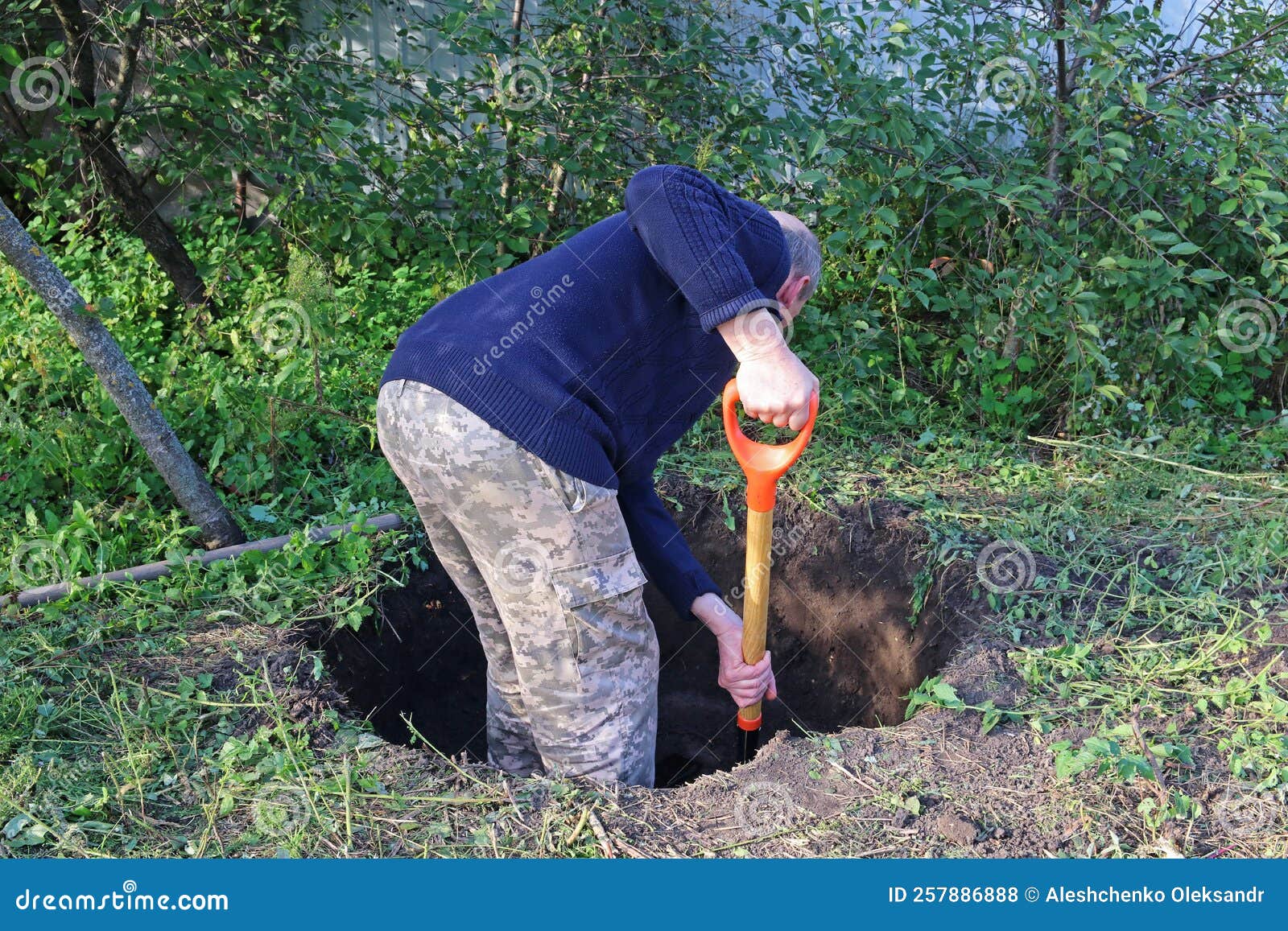 Man Digs a Deep Pit. Digging a Pit by Shovel Stock Photo - Image of ...