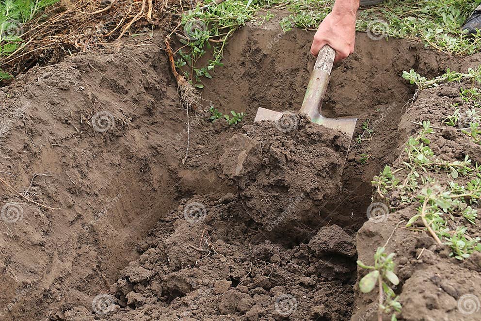 Man Digs a Deep Pit. Digging a Pit by Shovel Stock Image - Image of ...