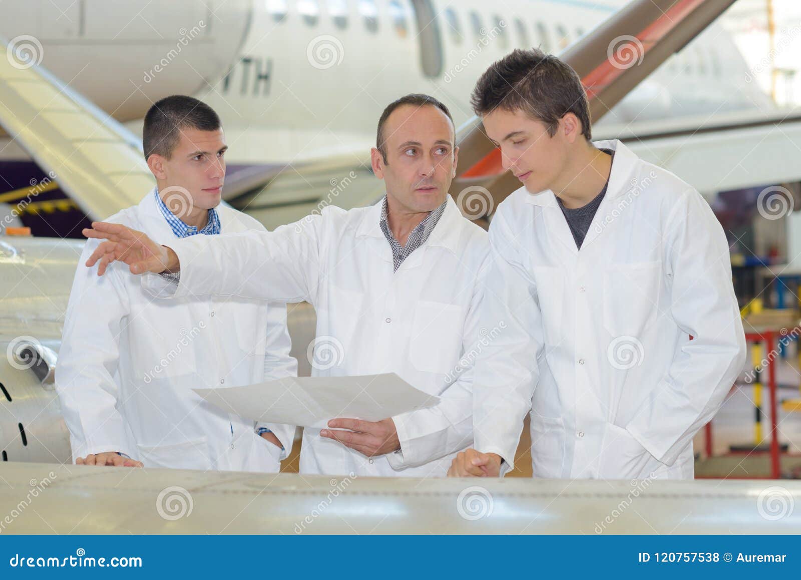 Man Directing Junior Workers Stock Photo - Image of aircraft, service ...