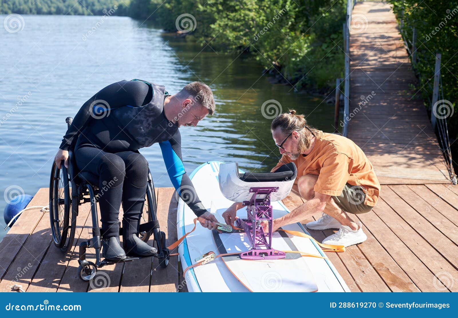 Man with Disability Ready To Go Wakeboarding Assembling Adaptive ...