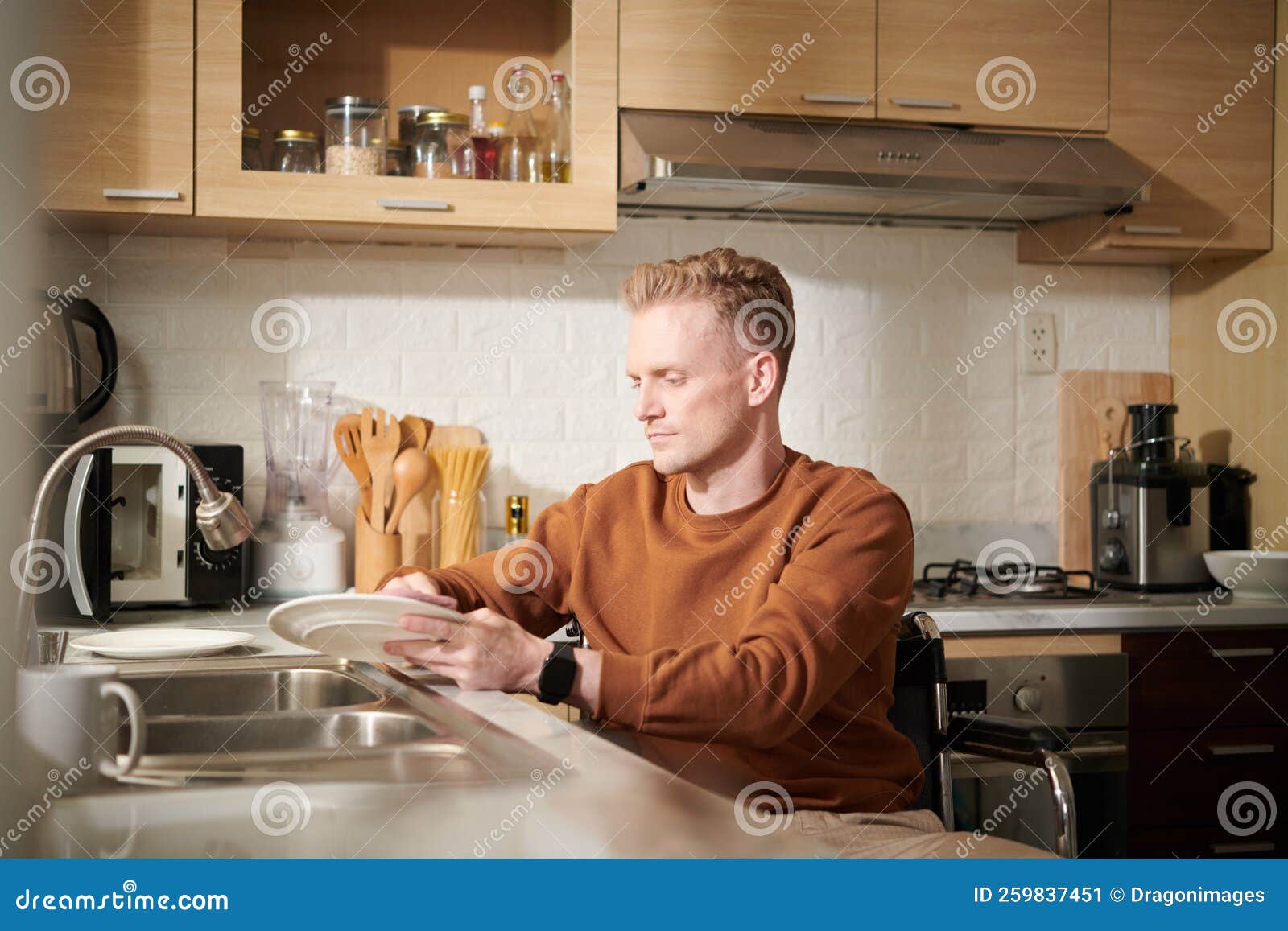 Man with Disability Washing Dishes Stock Image - Image of mobility ...