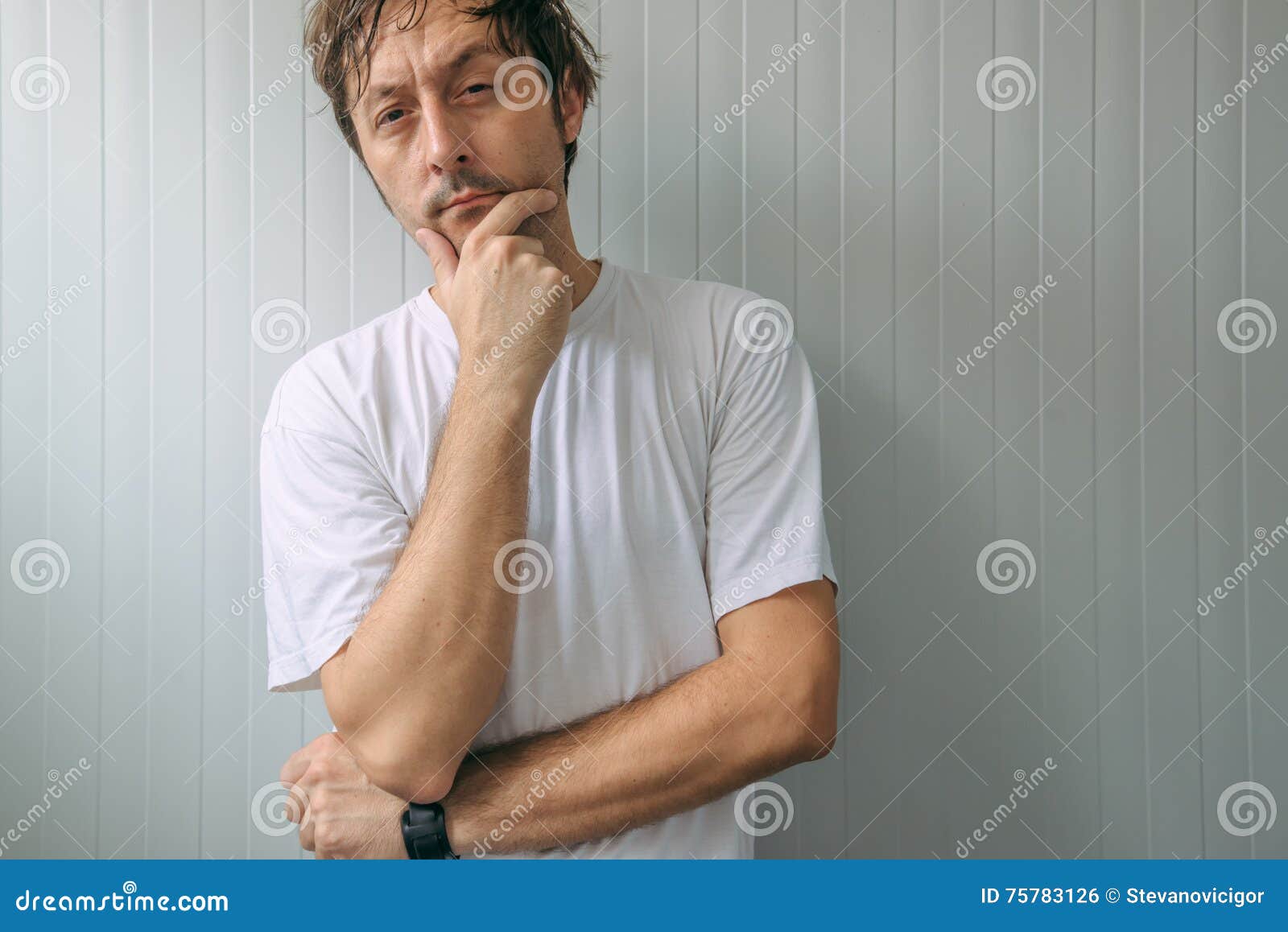 Man with Disapproving Look in Eyes and Raised Eyebrow Stock Photo ...