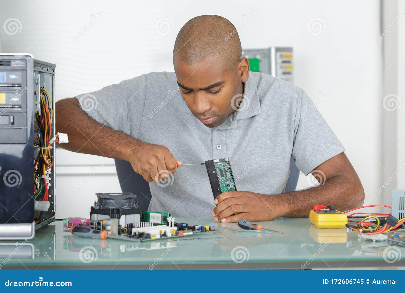 Man disassembling cpu stock image. Image of tools, assembling - 172606745