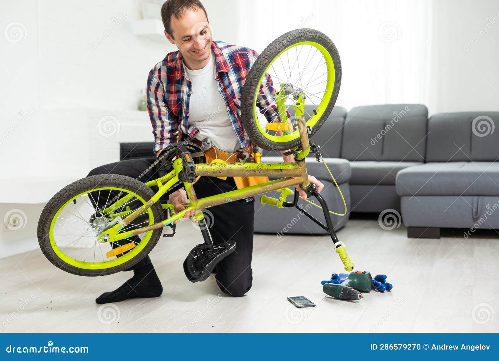 A Man is Disassembling a Mountain Bike for Maintenance. Concept of ...