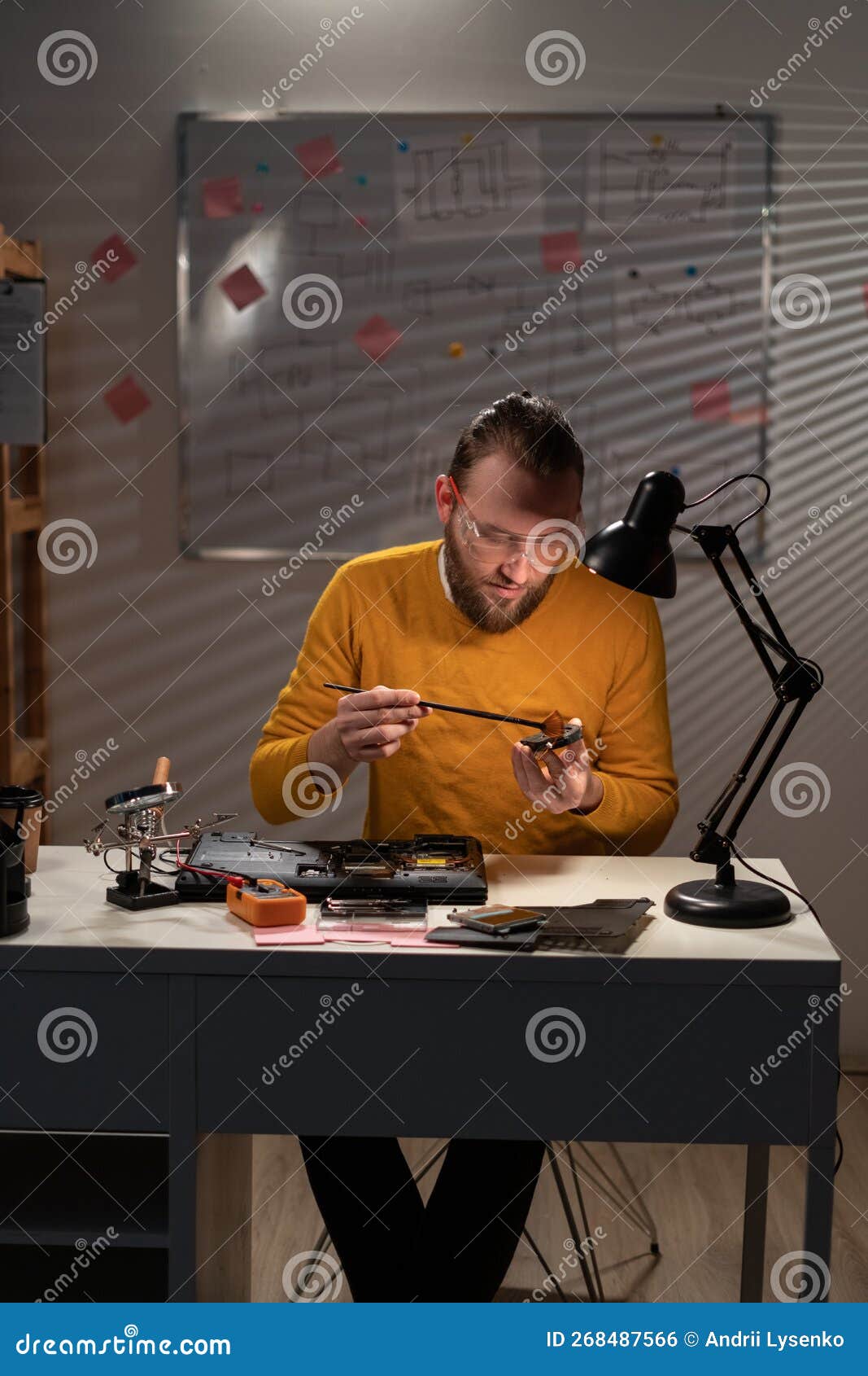Man Disassembling a Notebook and Cleaning Its Cooling System, Dirt on ...