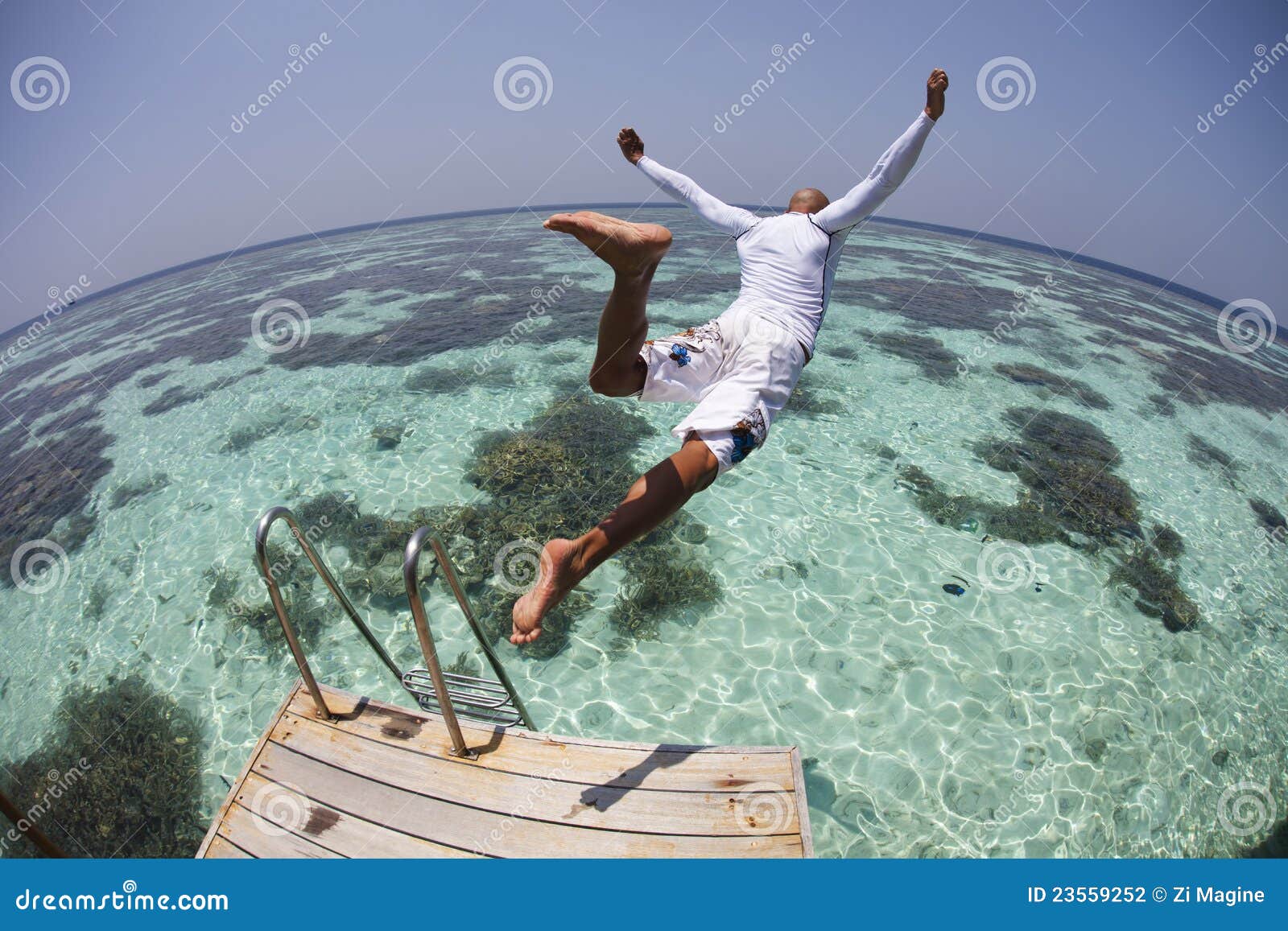 Man dive in blue lagoon stock photo. Image of health - 23559252