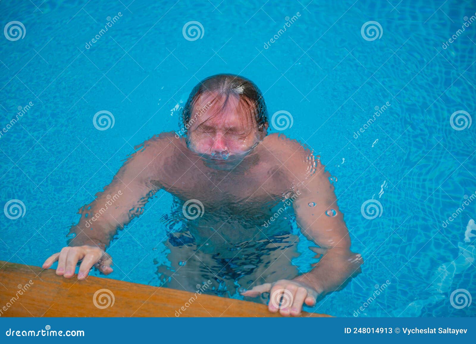 A man dived in a deep pool stock image. Image of holiday - 248014913