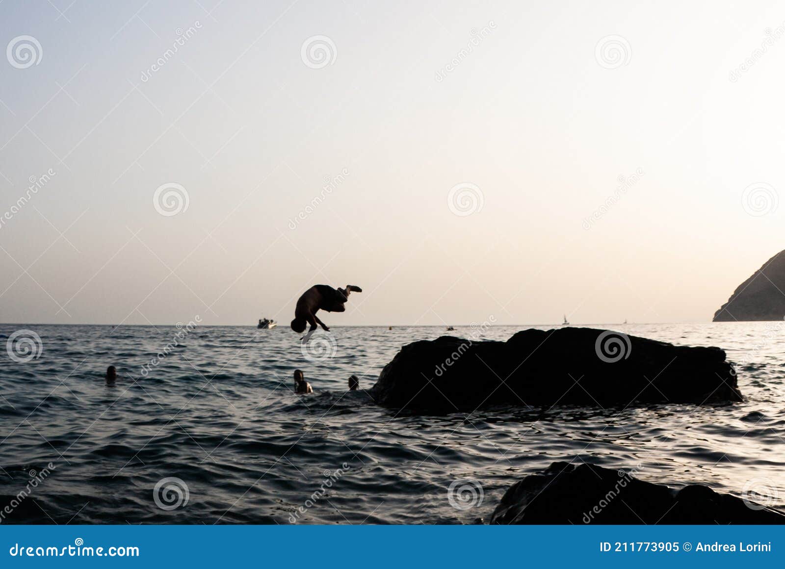Man Diving from a Cliff in the Sea Doing a Flip Editorial Image - Image ...