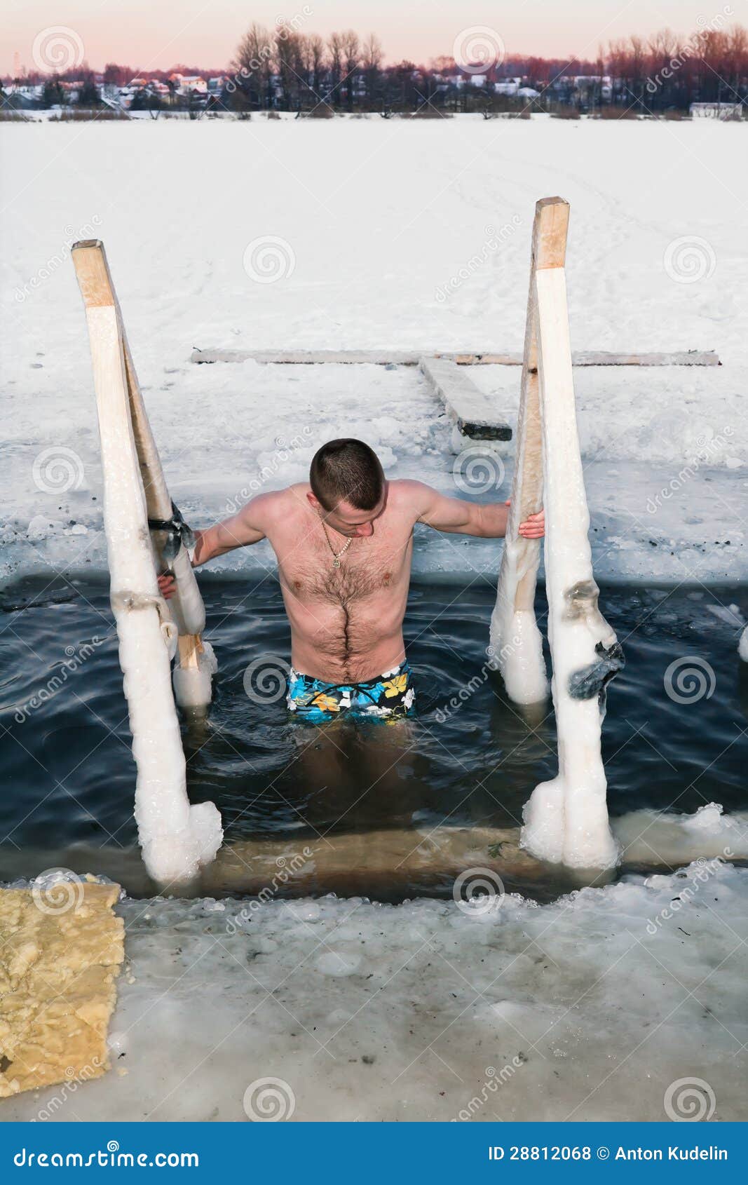 A Man Diving in the Ice-hole on the Lake in Winter Stock Photo - Image ...