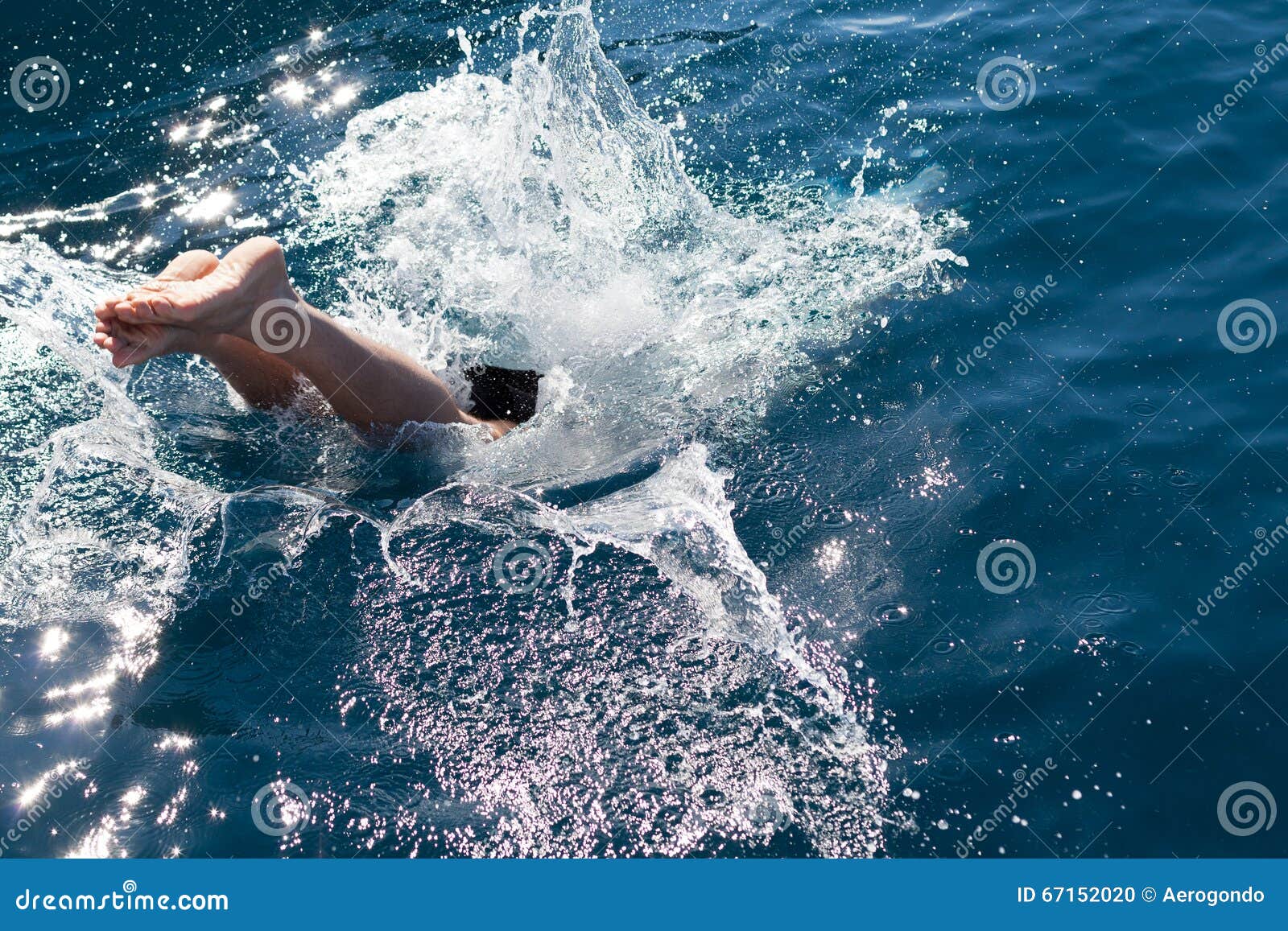 Man diving into the sea stock photo. Image of vacation - 67152020