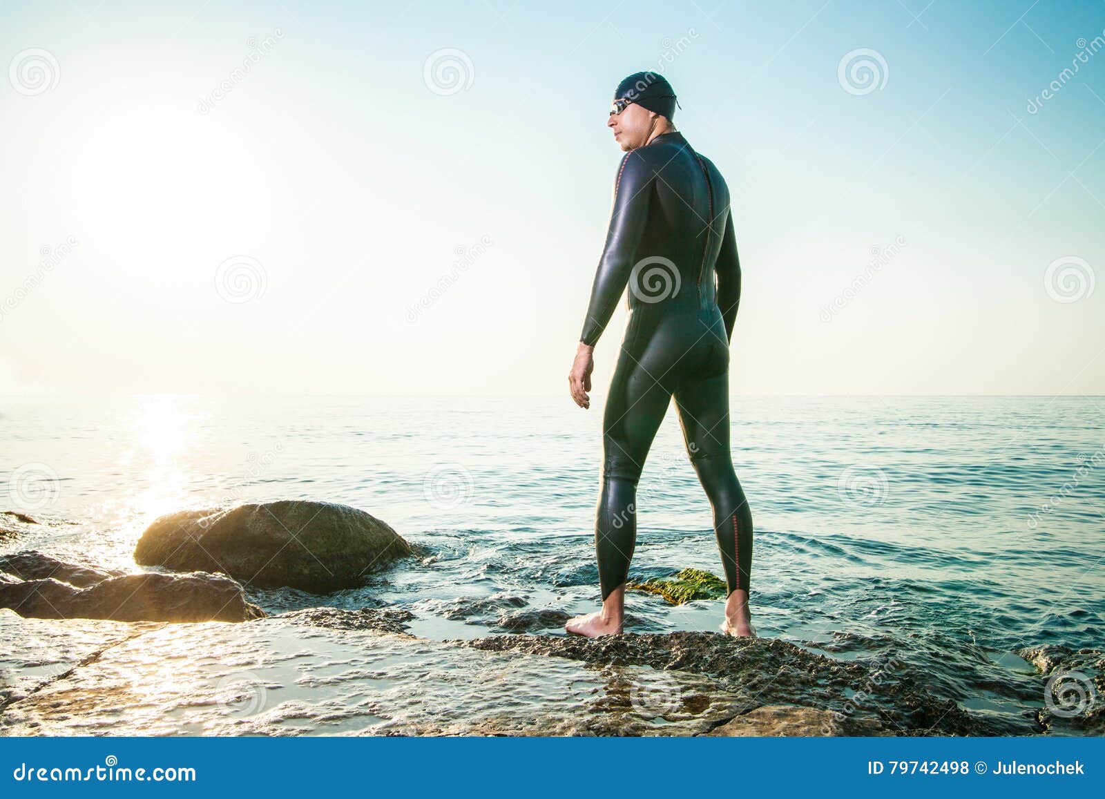 Man in Diving Suit Standing in Waves Stock Photo - Image of energy ...