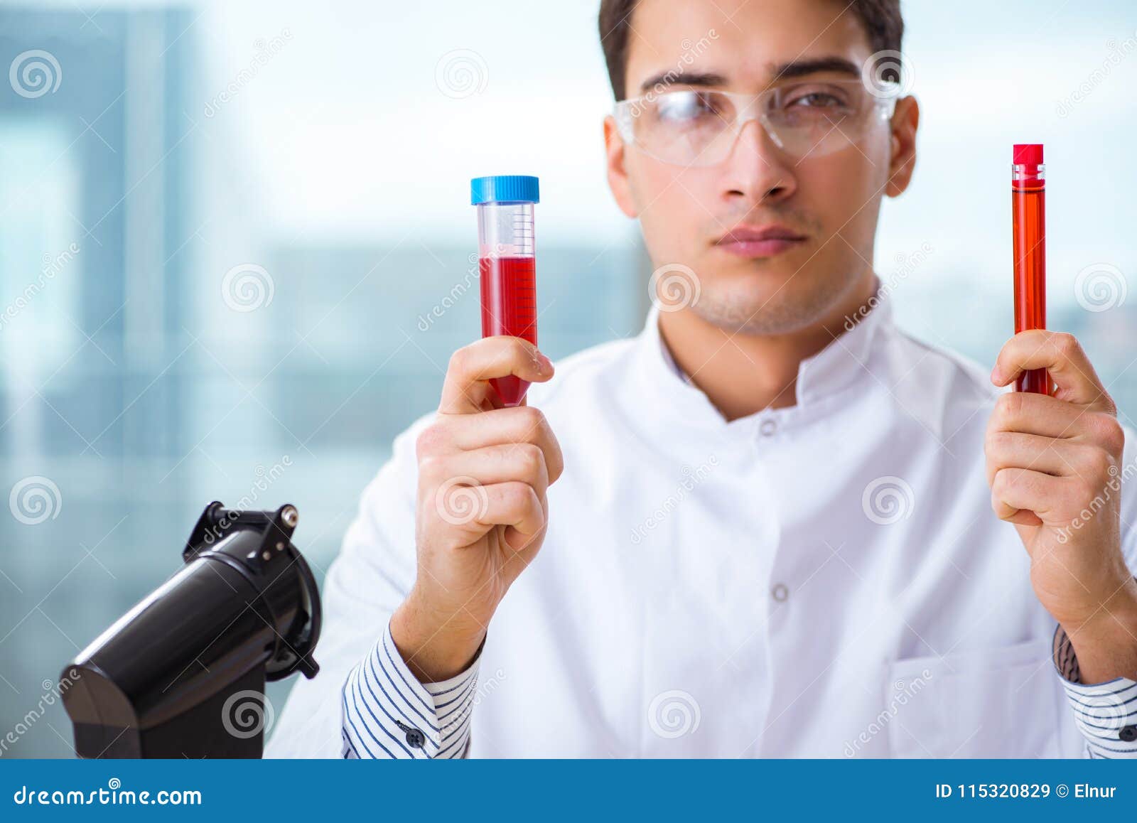The Man Doctor Checking Blood Samples in Lab Stock Image - Image of ...