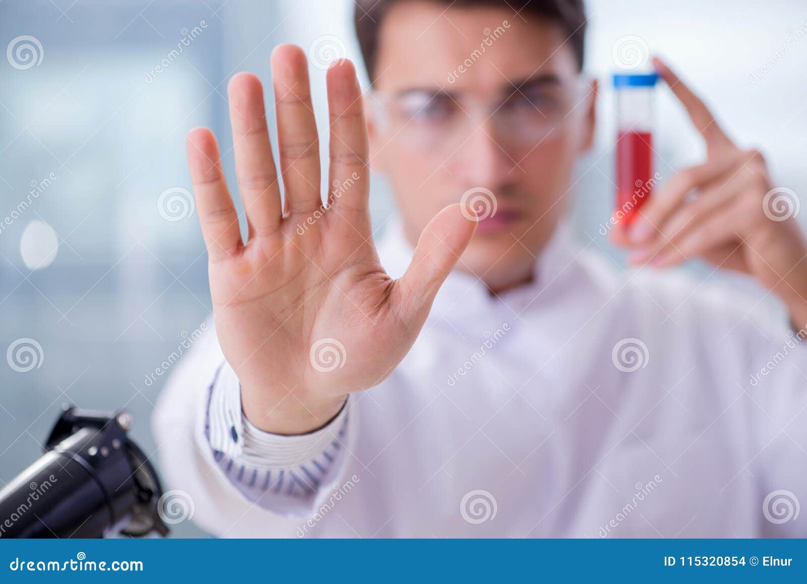 The Man Doctor Checking Blood Samples in Lab Stock Photo - Image of ...
