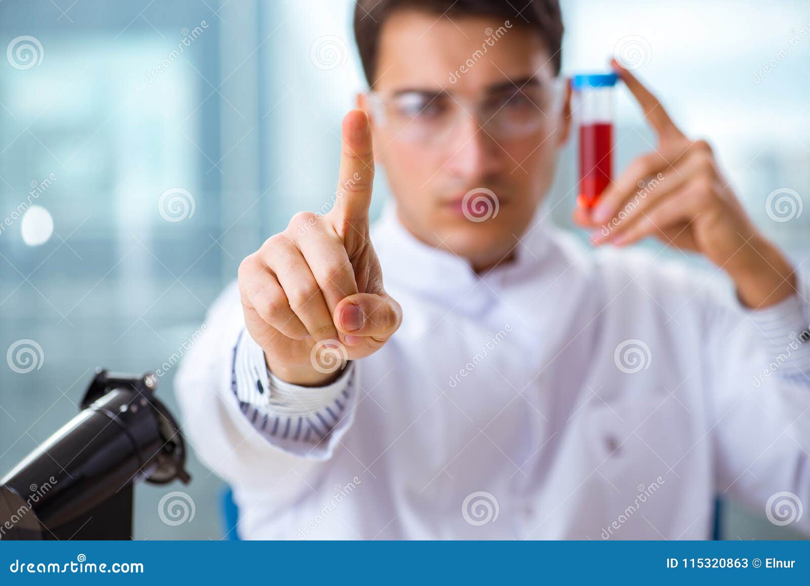 The Man Doctor Checking Blood Samples in Lab Stock Image - Image of ...