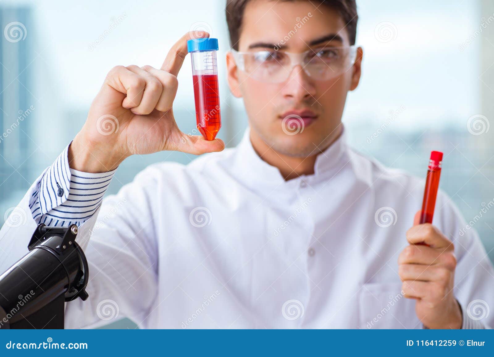 The Man Doctor Checking Blood Samples in Lab Stock Image - Image of ...