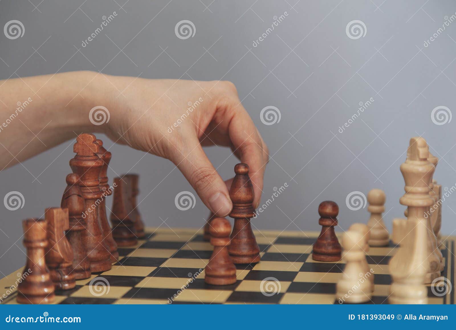 Man hand chess stock image. Image of strategic, move - 181393049