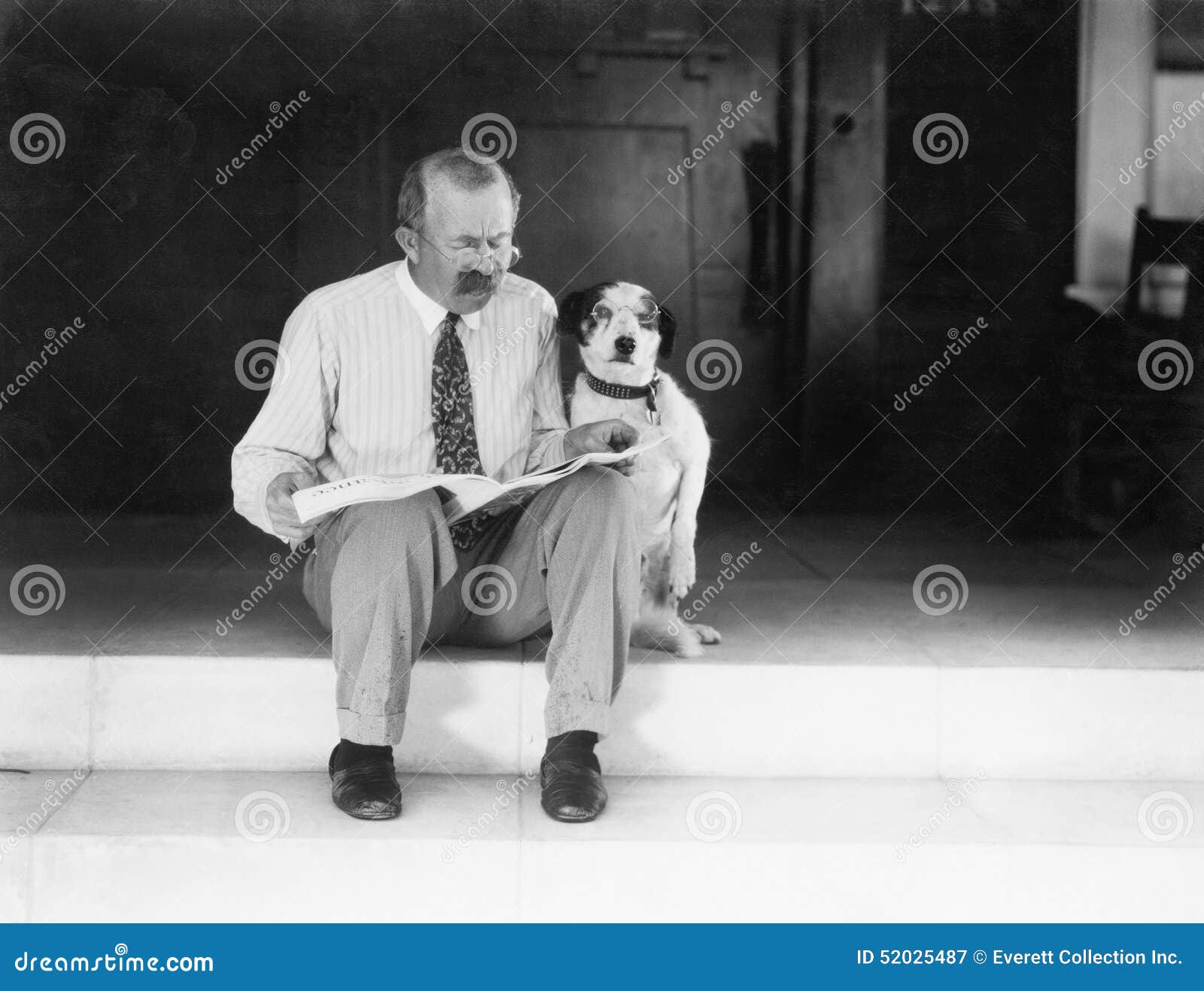 Man and Dog Sitting on the Steps Reading the Newspaper Stock Image ...