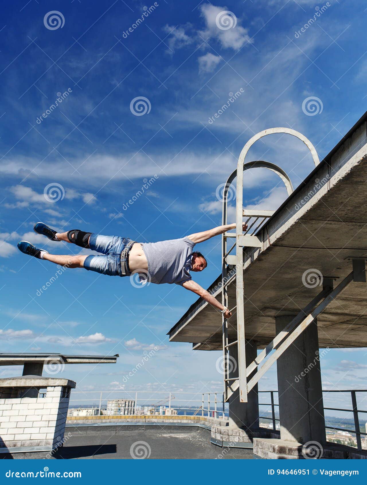 Man Doing an Acrobatic Stunt Stock Image - Image of casual, climbing ...