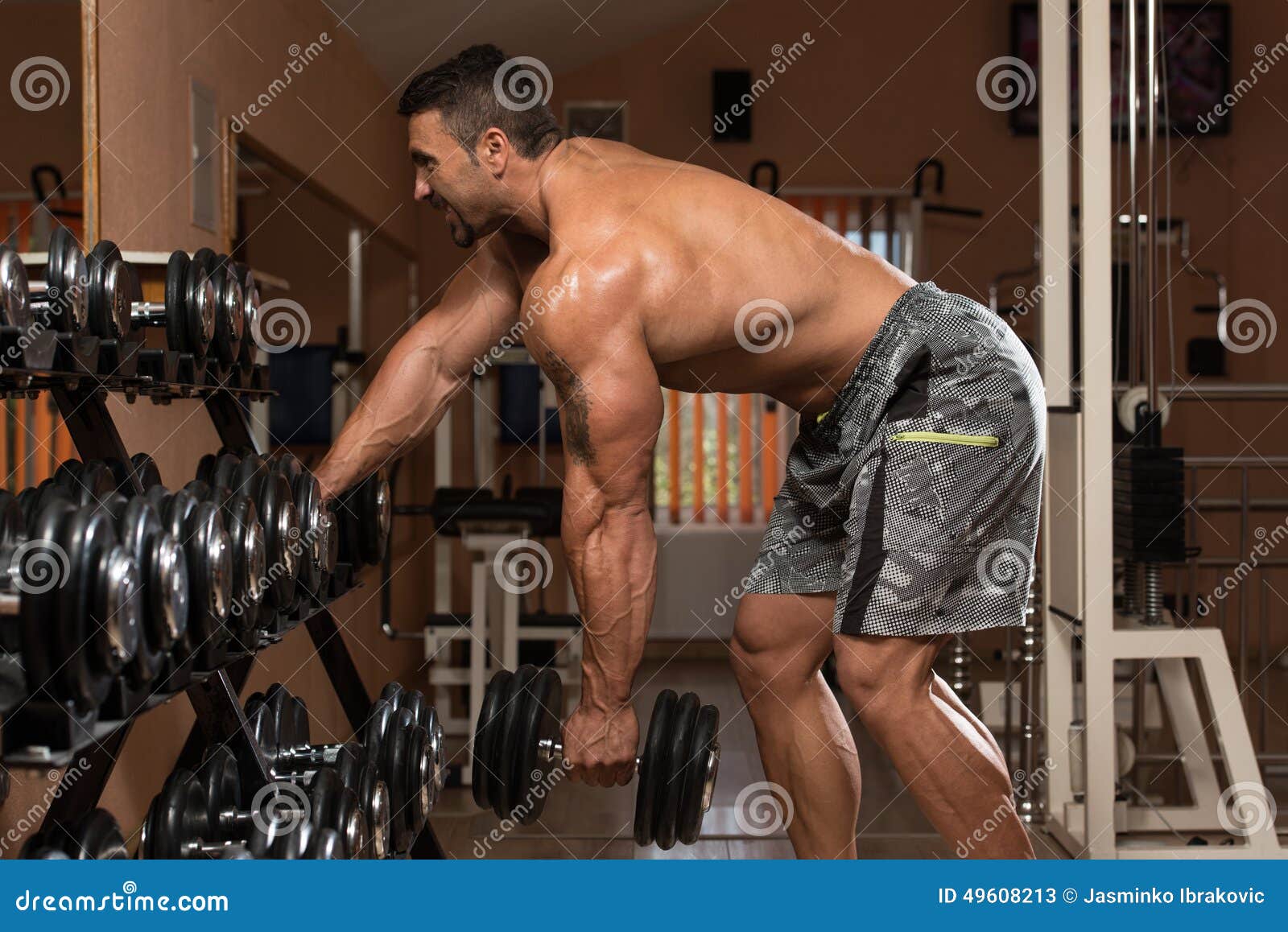 Man Doing Back Exercises in the Gym Stock Image - Image of flexing ...