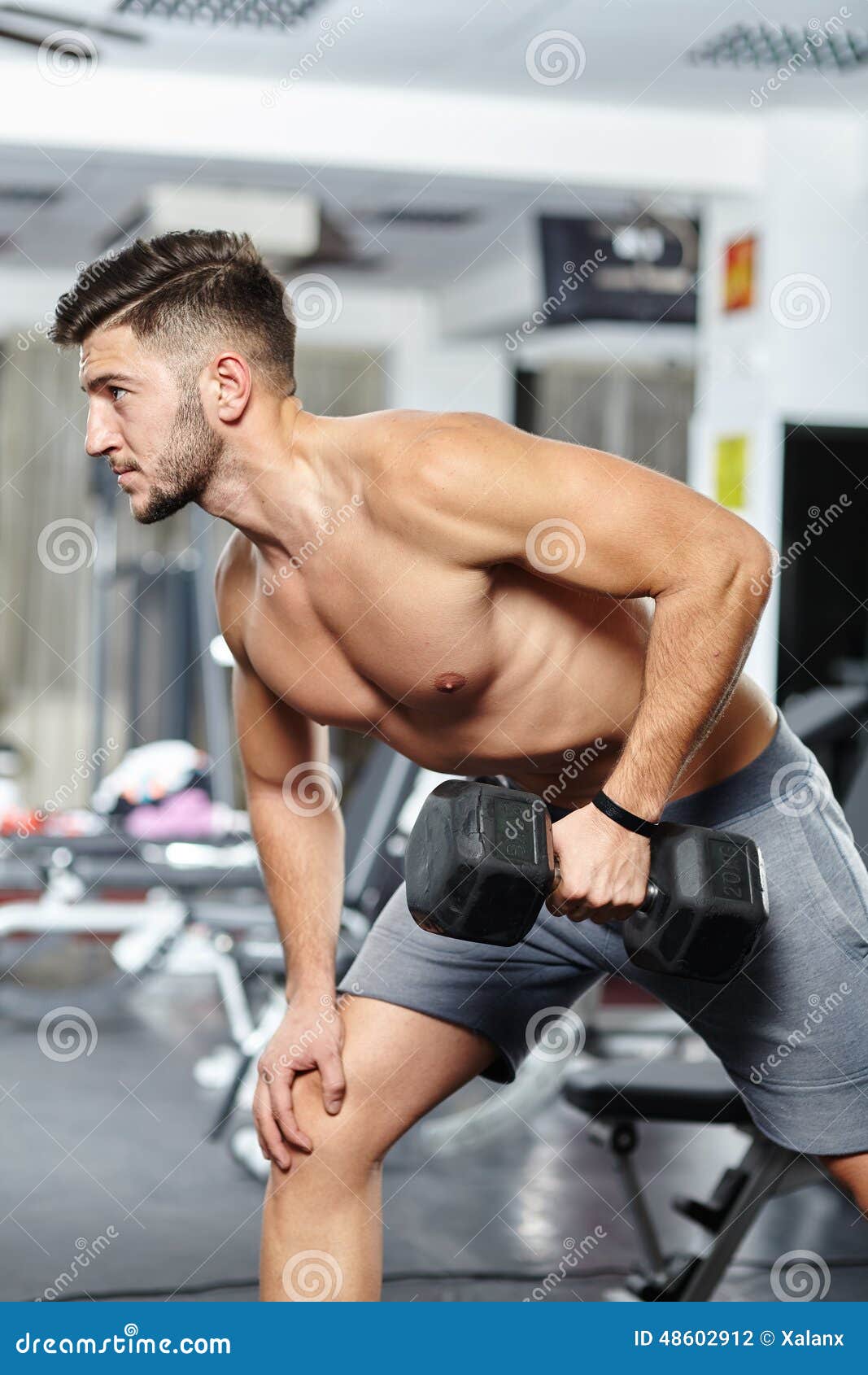 Man doing back workout stock photo. Image of exercising - 48602912