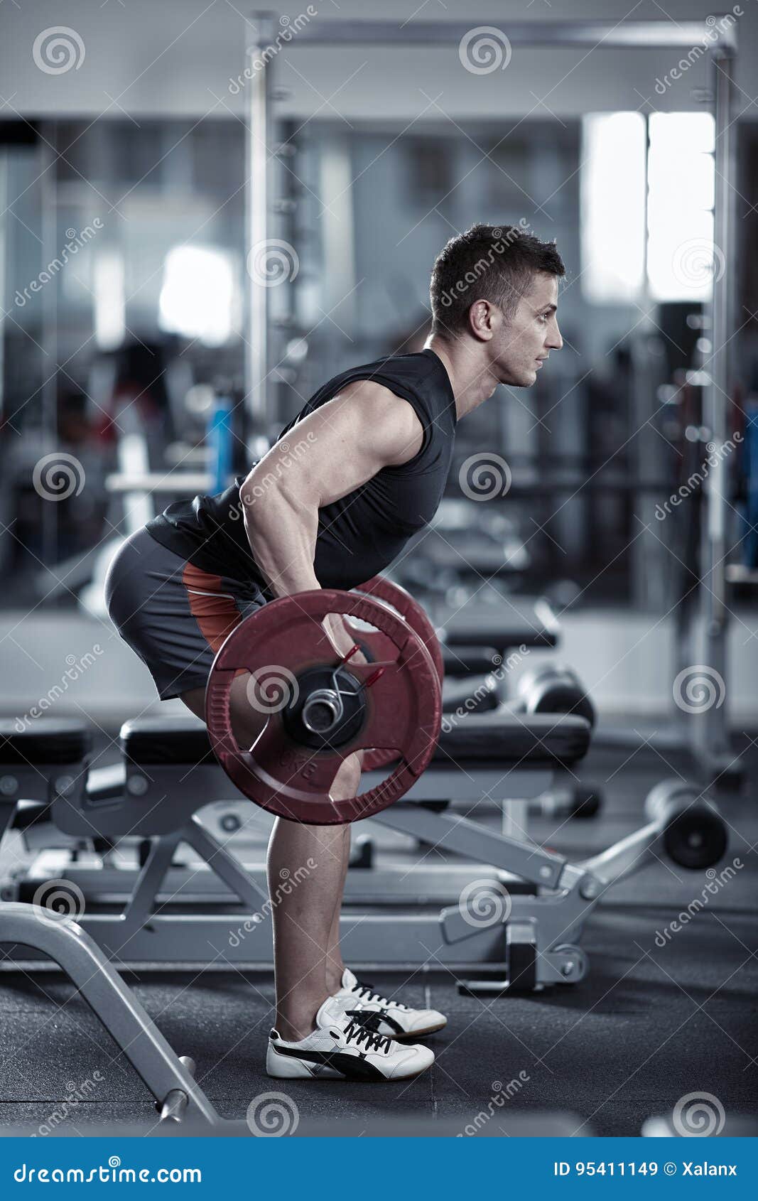 Man doing barbell row stock image. Image of equipment - 95411149