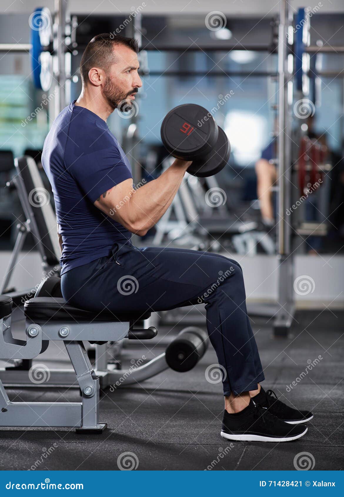 Man Doing Biceps Curl Seated Stock Image - Image of lifestyle, indoor ...