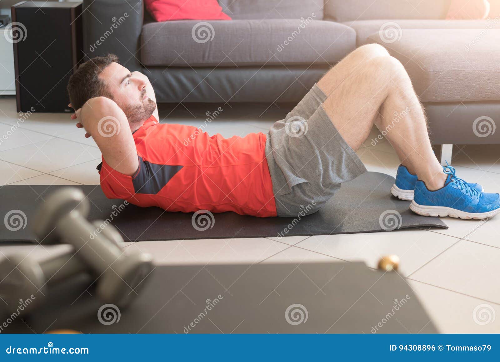 Man Doing Body Exercise and Working Out at Home Stock Photo - Image of ...