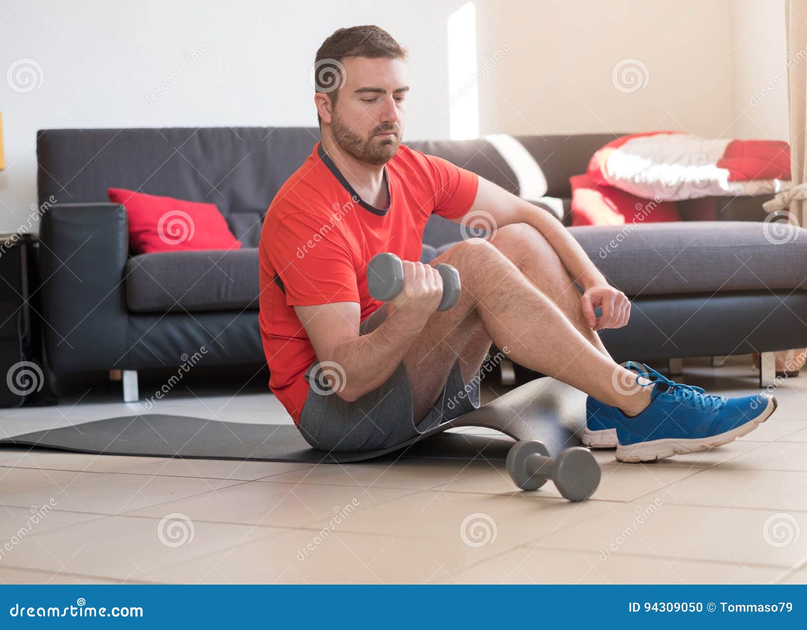 Man Doing Body Exercise and Working Out Home Stock Photo - Image of ...