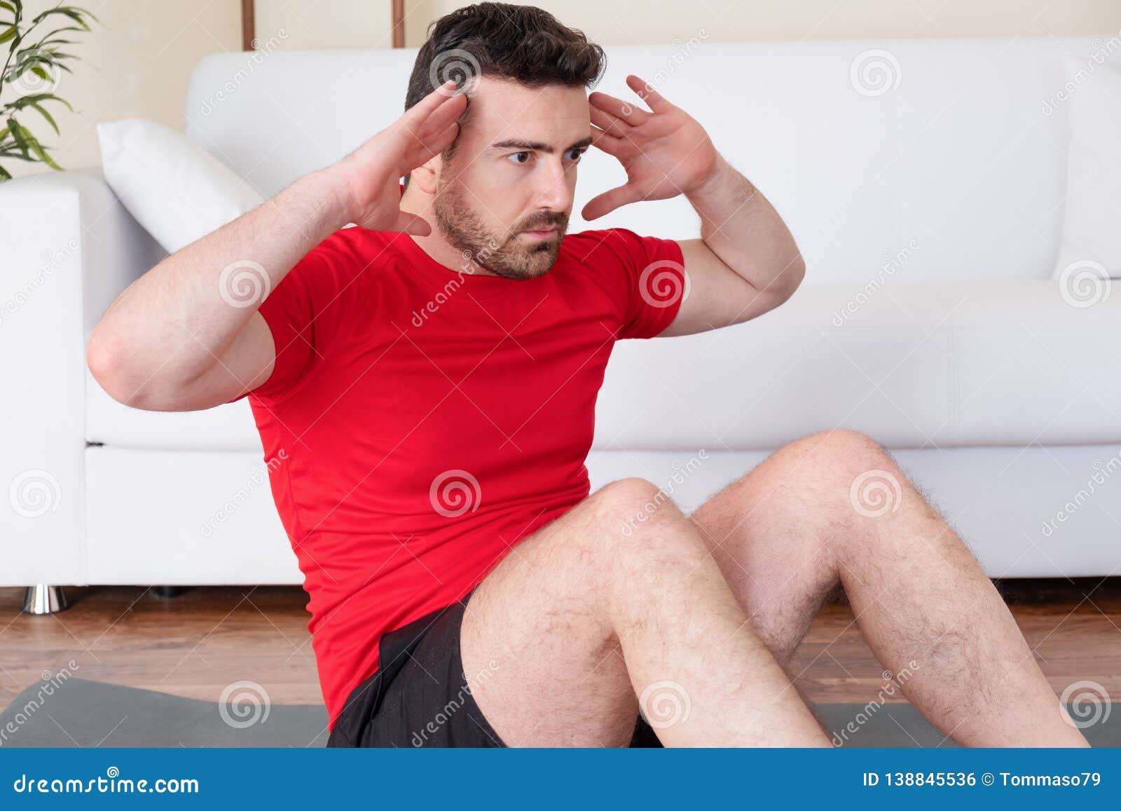 Man Doing Body Exercise and Working Out at Home Stock Photo - Image of ...