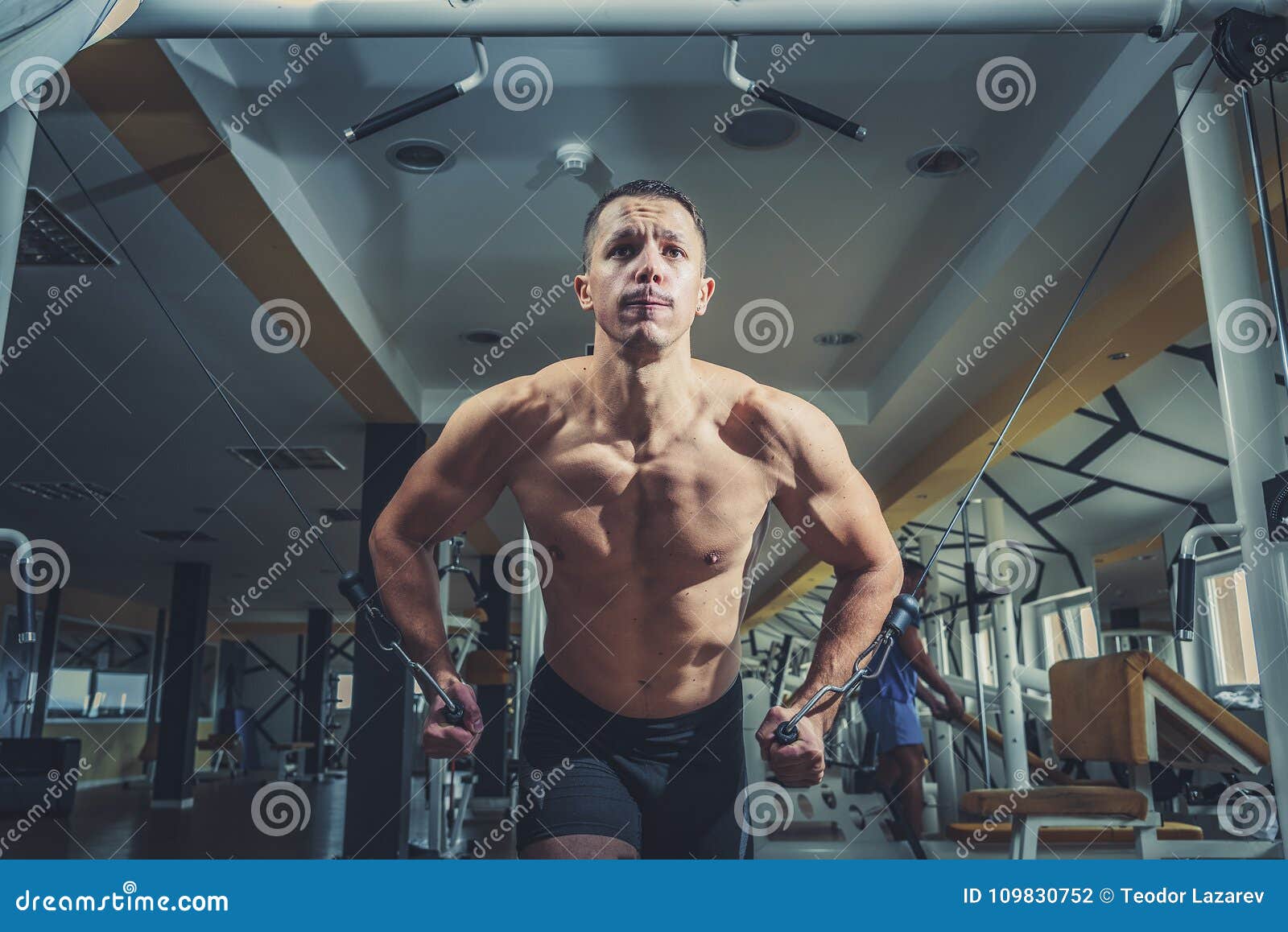 Man Doing Cable Fly Exercise in Gym Stock Photo - Image of lifting ...