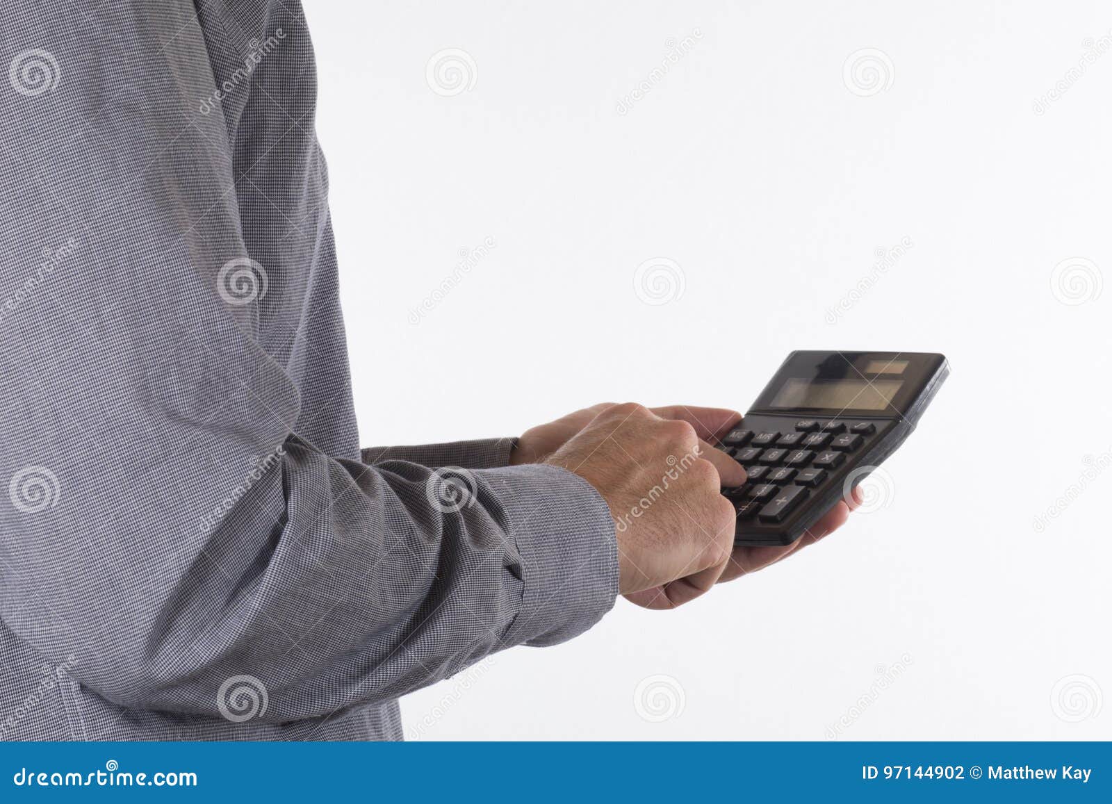 Man Doing a Calculation on a Handheld Calculator Stock Photo - Image of ...